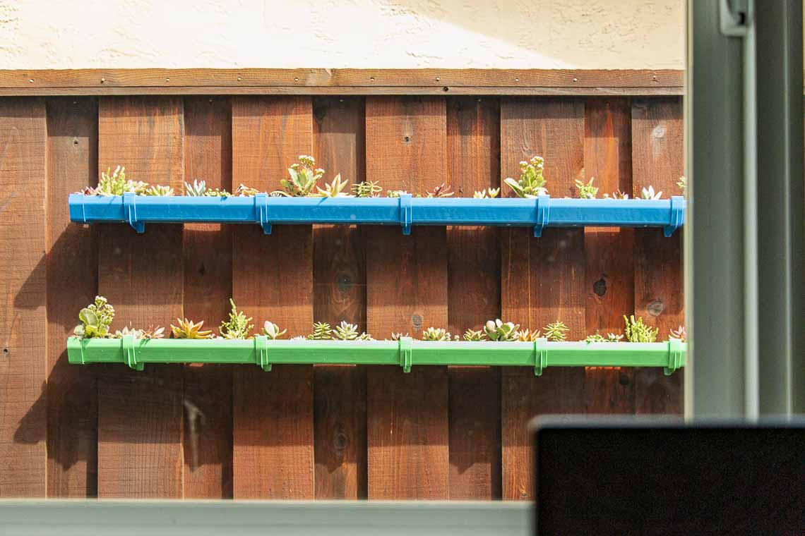 How to Make a Bold and Beautiful Rain Gutter Garden • IkornCrafts